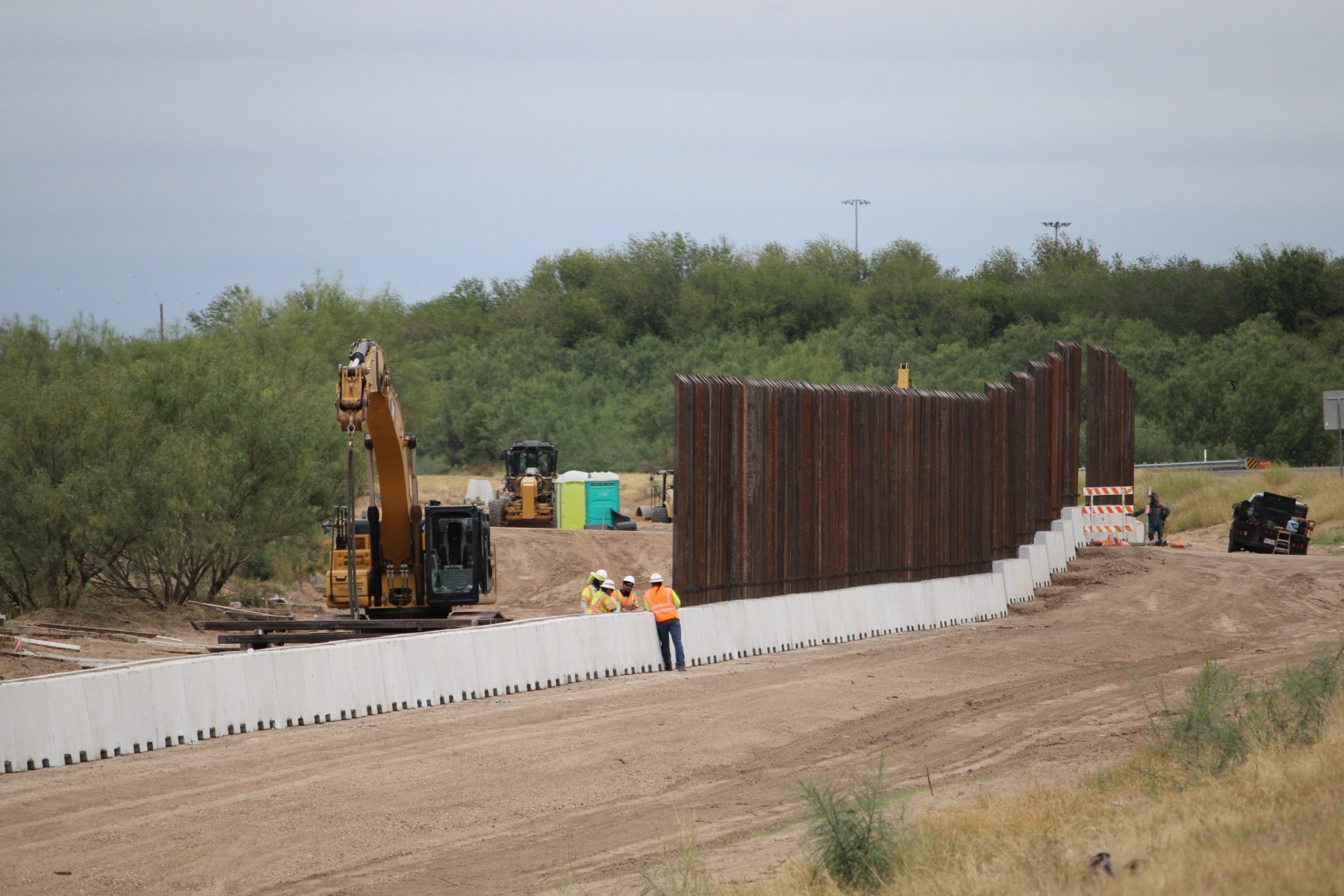 EXCLUSIVE PHOTOS: Texas Installs Border Barrier Made of Shipping ...